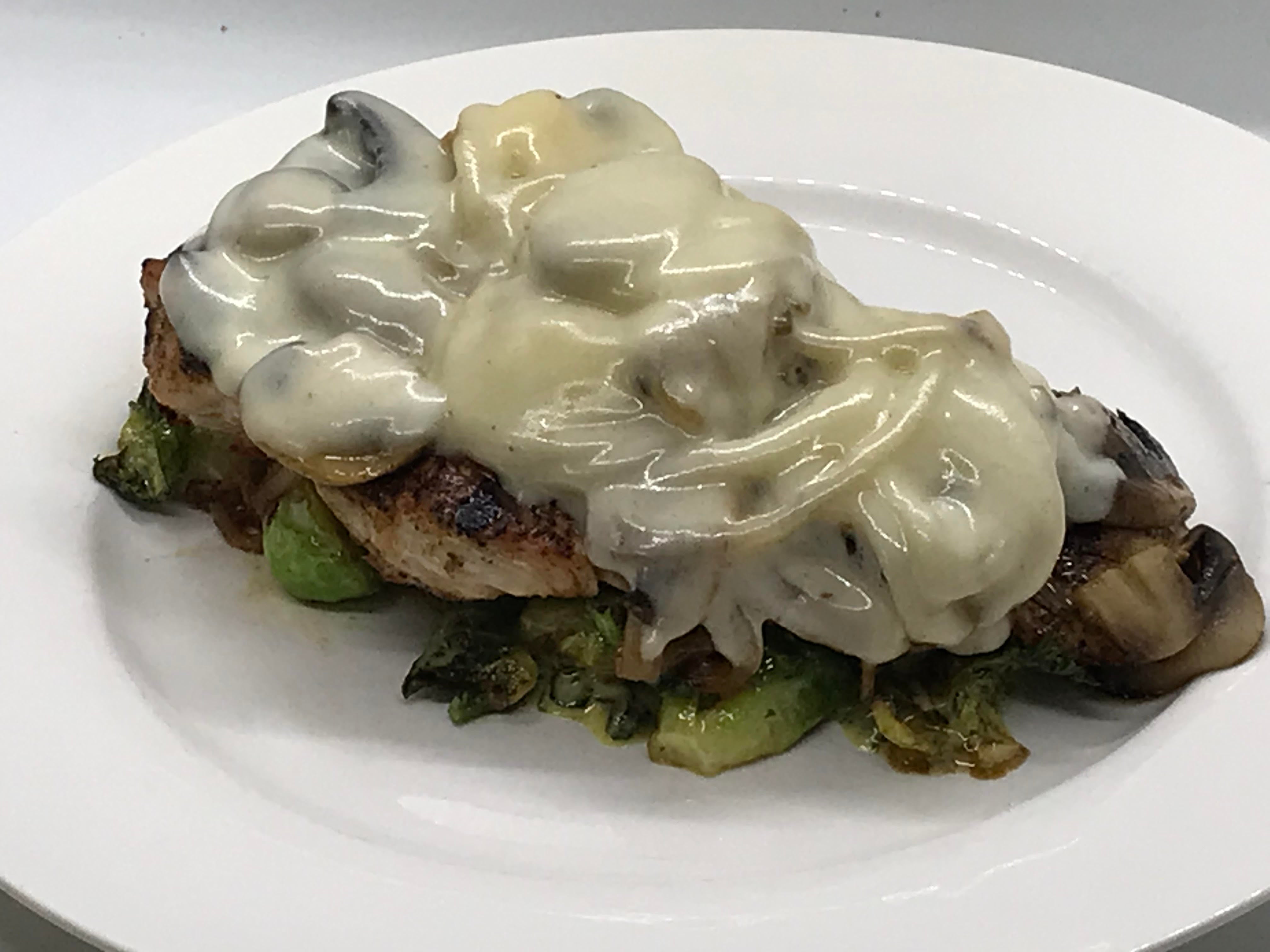 Cheesy Smothered Chicken | Toad Hollar Bar & Grill